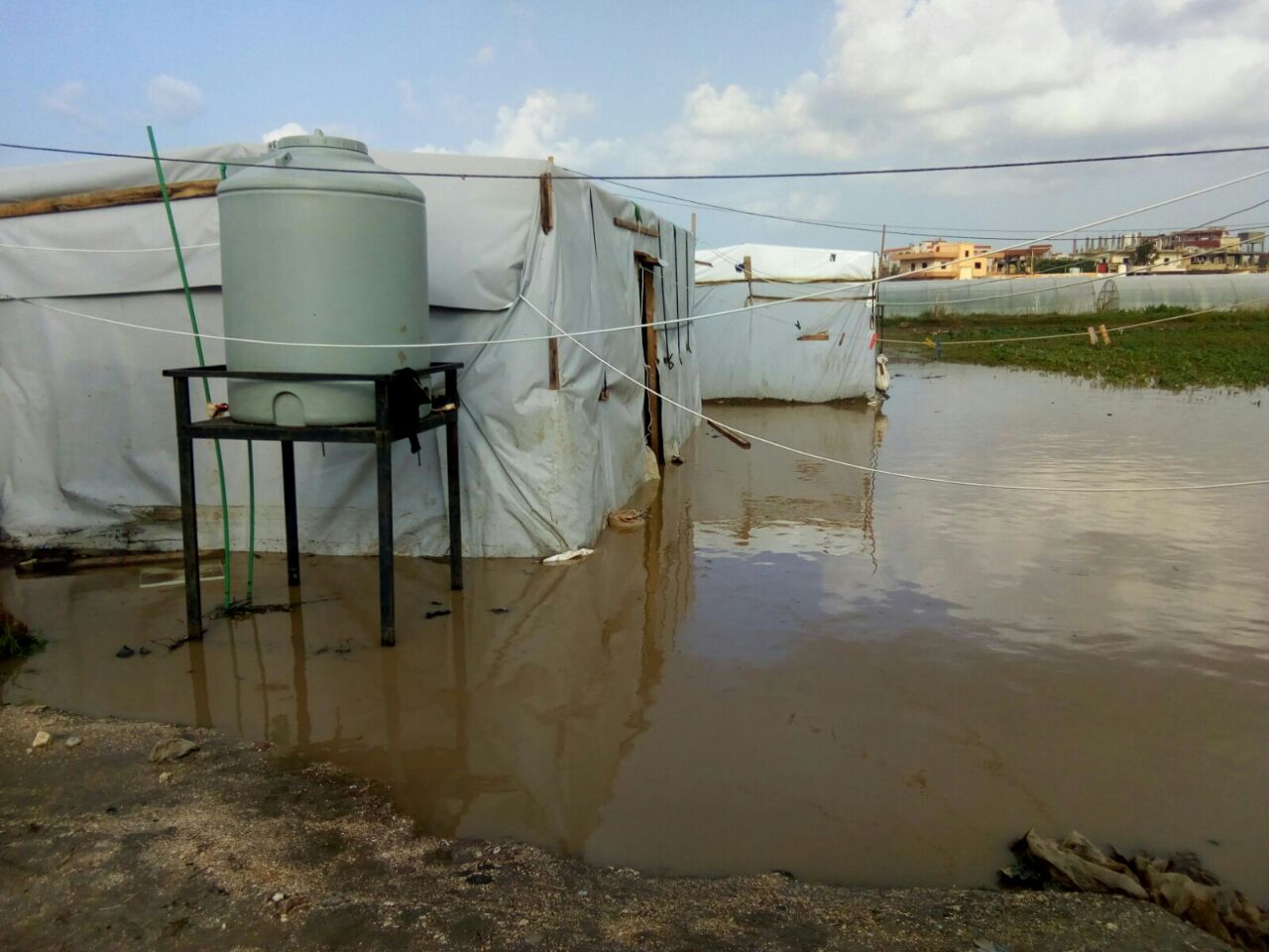 [PHOTOS] Refugee camps in Akkar drowning in water - Lebanon News
