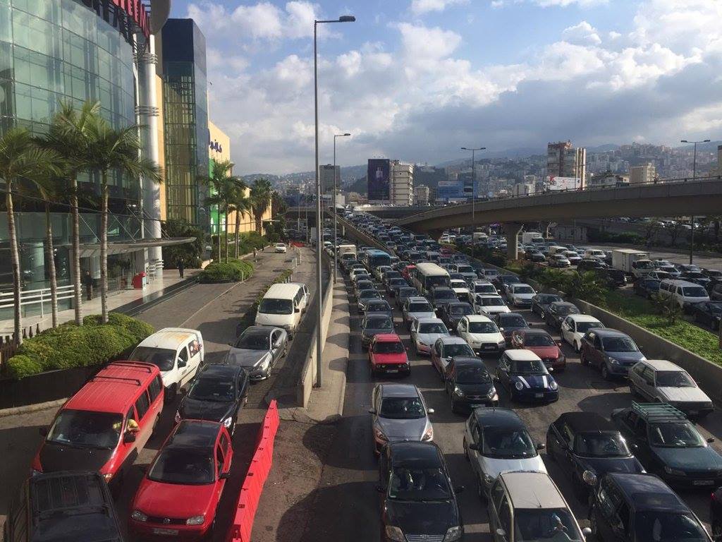 Commuters get stuck in their vehicles after closing roads in Beirut ...