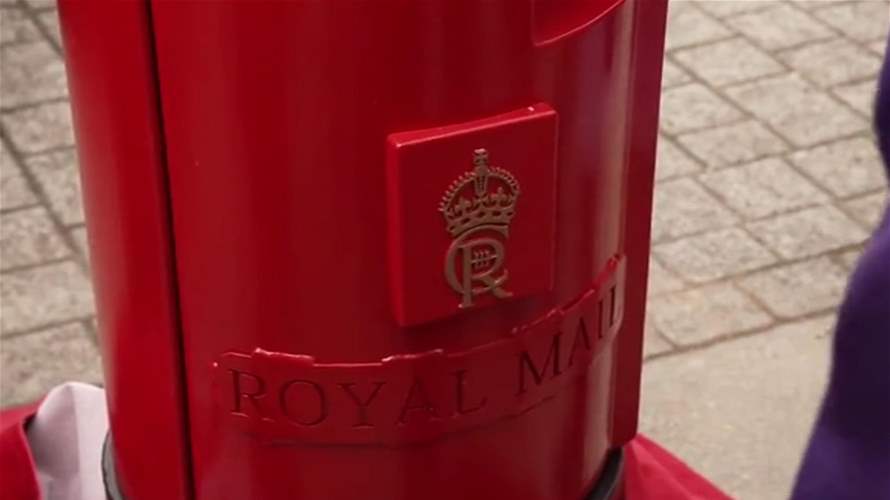 Britain unveils first red postbox bearing King Charles emblem - Lebanon ...