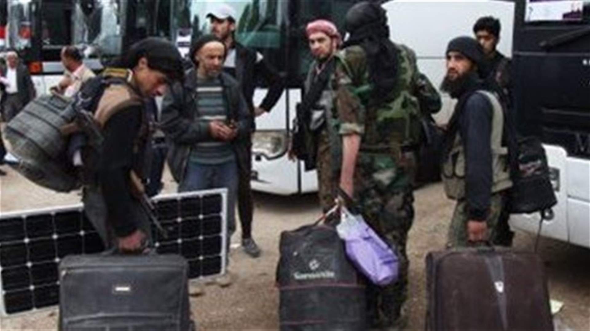 Syrian monitor says insurgents quit enclave, state media denies it ...