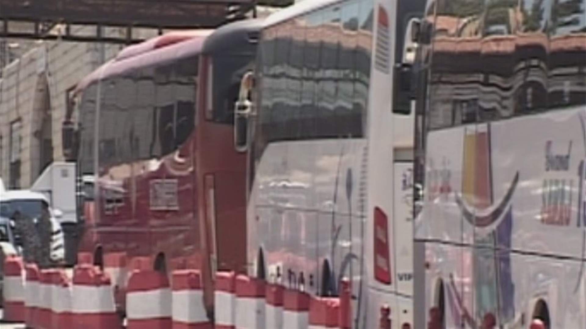 Buses carrying Syrian refugees depart from Masnaa border crossing ...